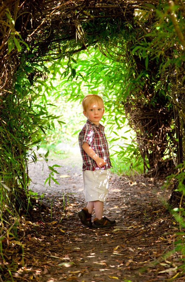 Toddler Boy Smiling in the Woods Stock Image - Image of smiling ...