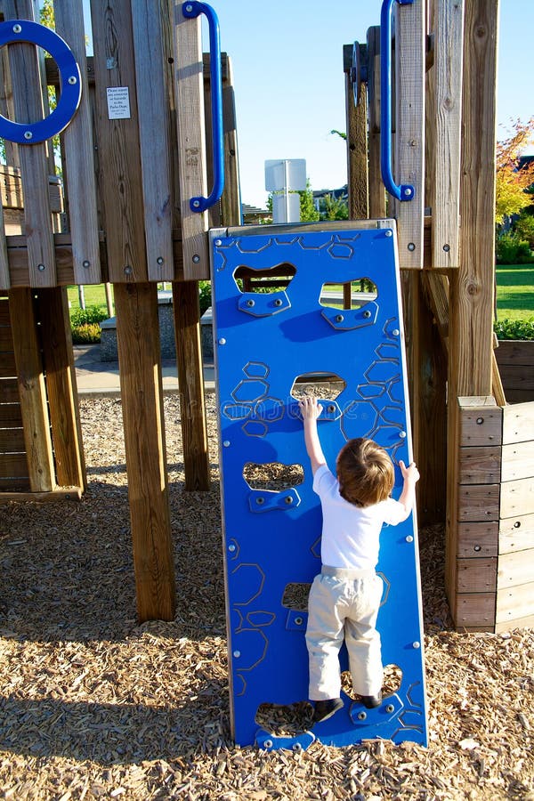 Toddler at Climbing Ramp stock image. Image of year, climb - 25833641