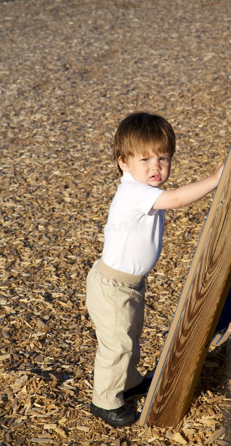 Toddler at Climbing Ramp stock image. Image of year, climb - 25833641