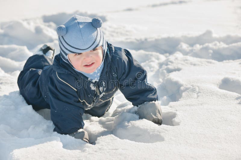 Toddler discovering snow stock image. Image of crawling - 20462079