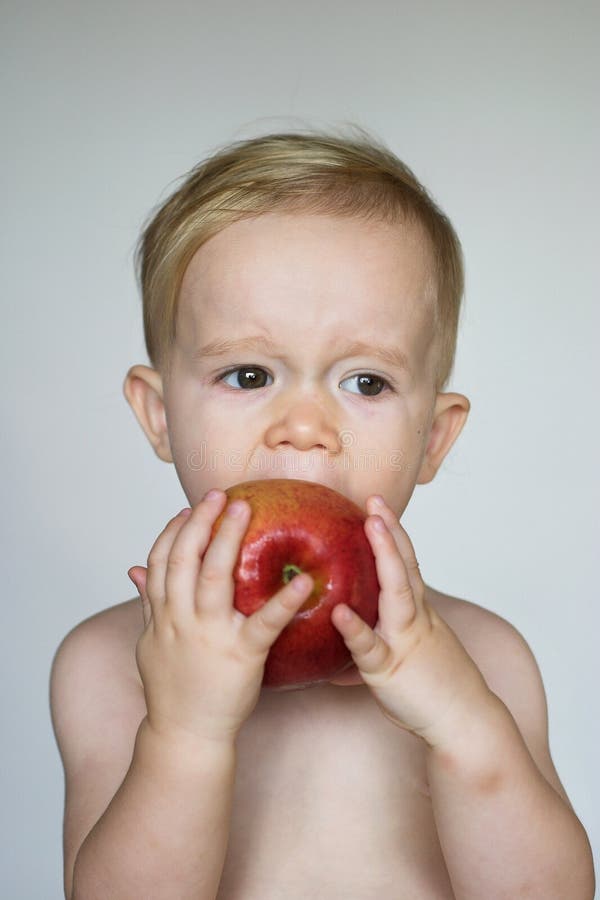 Toddler Eating Apple stock photo. Image of good, colours - 3021350