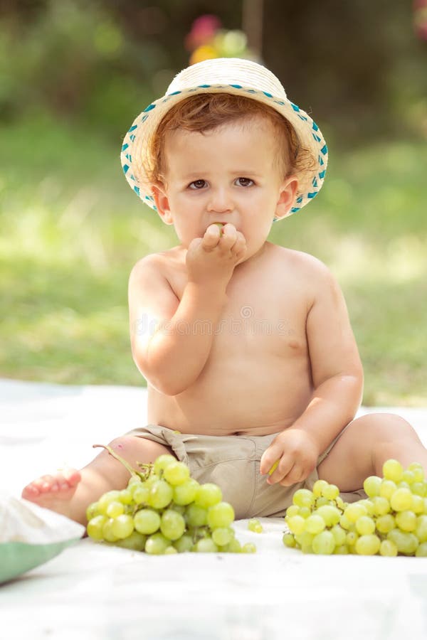 542 Boy Eating Grapes Stock Photos - Free & Royalty-Free Stock Photos ...