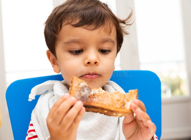 101 Boy Eating Toast Butter Stock Photos - Free & Royalty-Free Stock ...