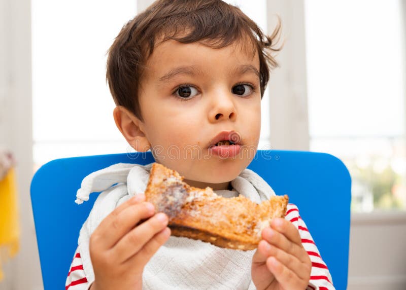 101 Boy Eating Toast Butter Stock Photos - Free & Royalty-Free Stock ...