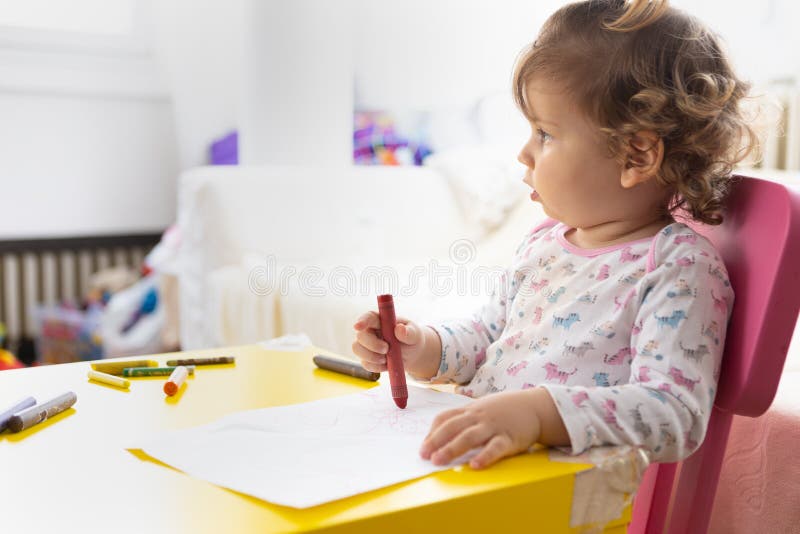 Toddler Girl Drawing with Crayons on Paper Stock Photo - Image of ...