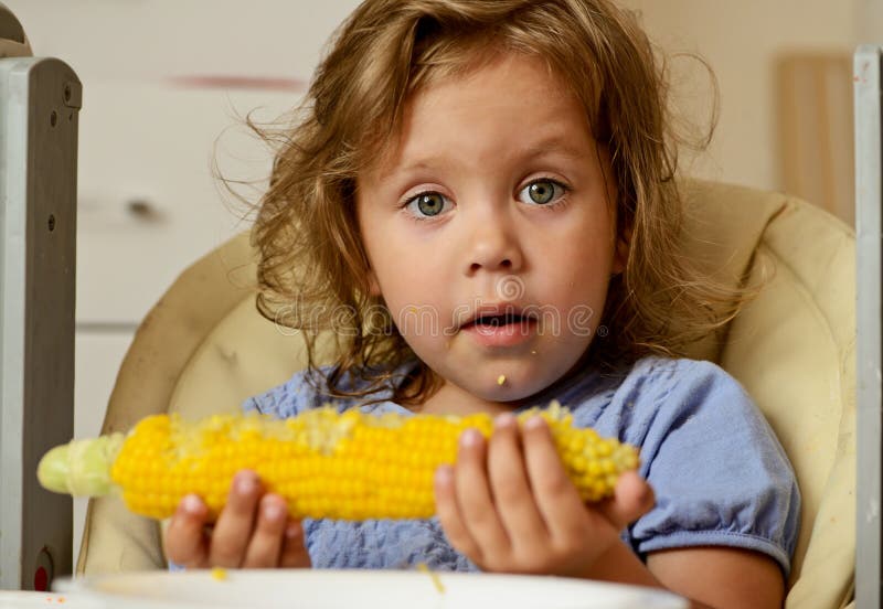 Toddler girl eating corn stock image. Image of face, fresh - 48636209