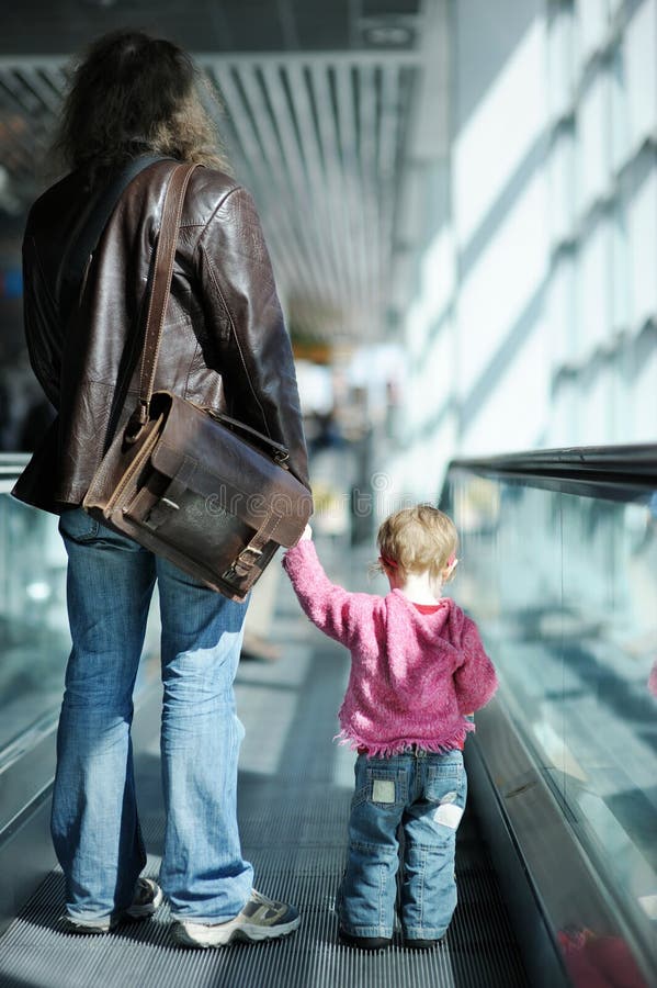 Toddler Girl and Her Father on an Escalator Stock Image - Image of ...