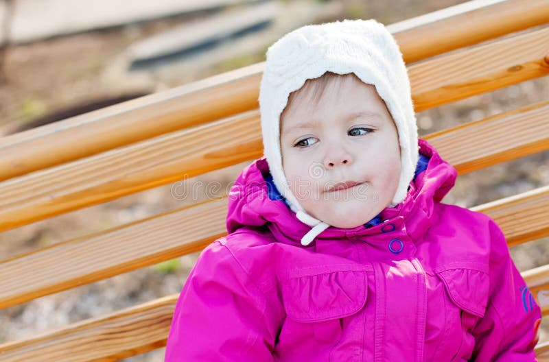 Toddler Girl Sitting on the Bench Stock Image - Image of childhood ...
