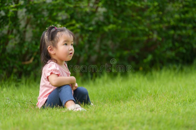 Toddler Girl Sitting in Field Stock Image - Image of infant, beautiful ...