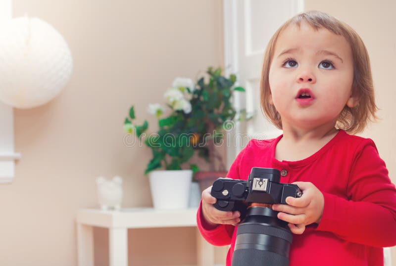 Toddler Girl Using Playing with a Camera Stock Image - Image of cute ...