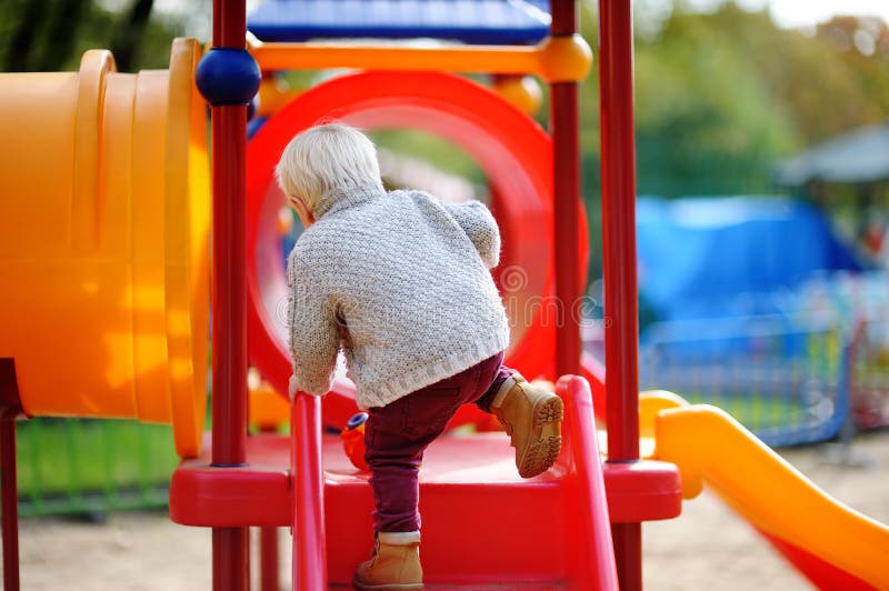 Toddler Having Fun on Playground Stock Image - Image of cheerful ...