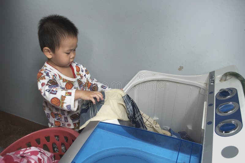 Toddler help wash coverlet stock photo. Image of baby - 38712702