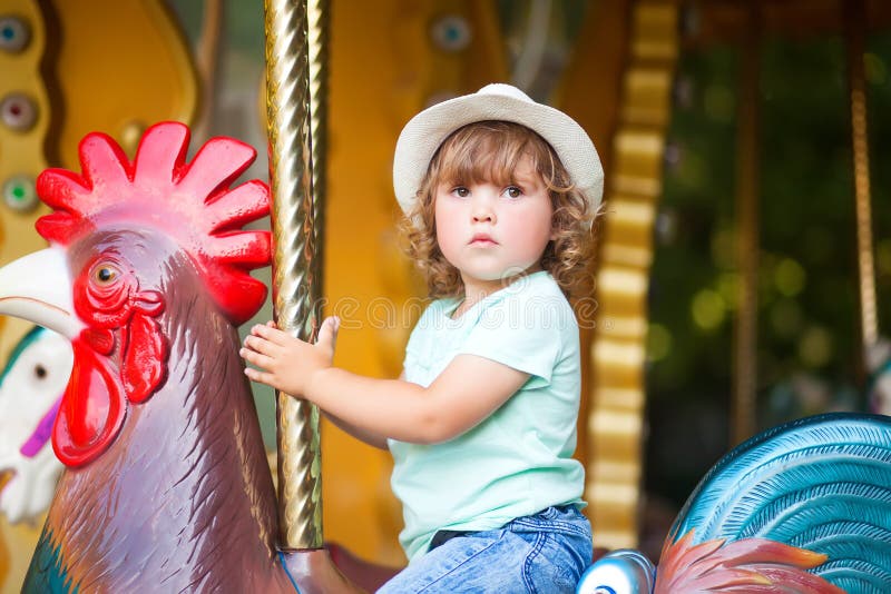 982 Kid Riding Carousel Stock Photos - Free & Royalty-Free Stock Photos ...