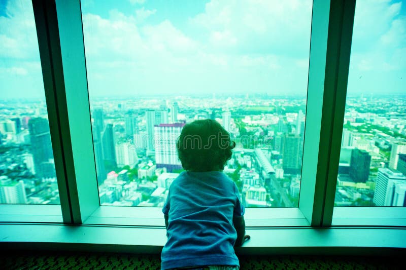 Toddler Looking Through Clear Glass Window Stock Photo - Image of glass ...