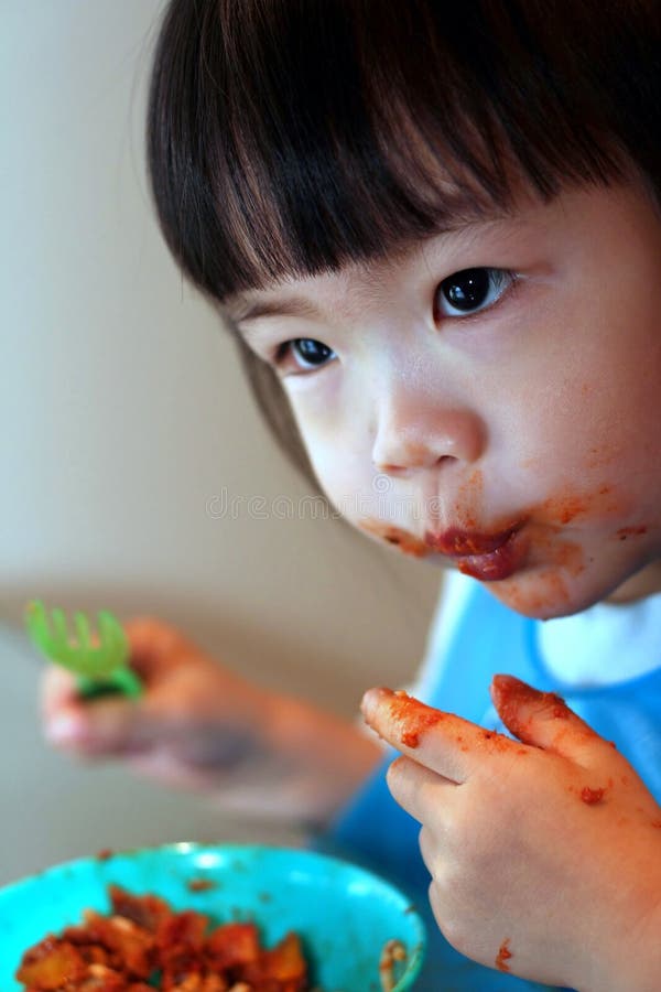 Toddler Messy Eating stock image. Image of messy, enjoy - 3668507