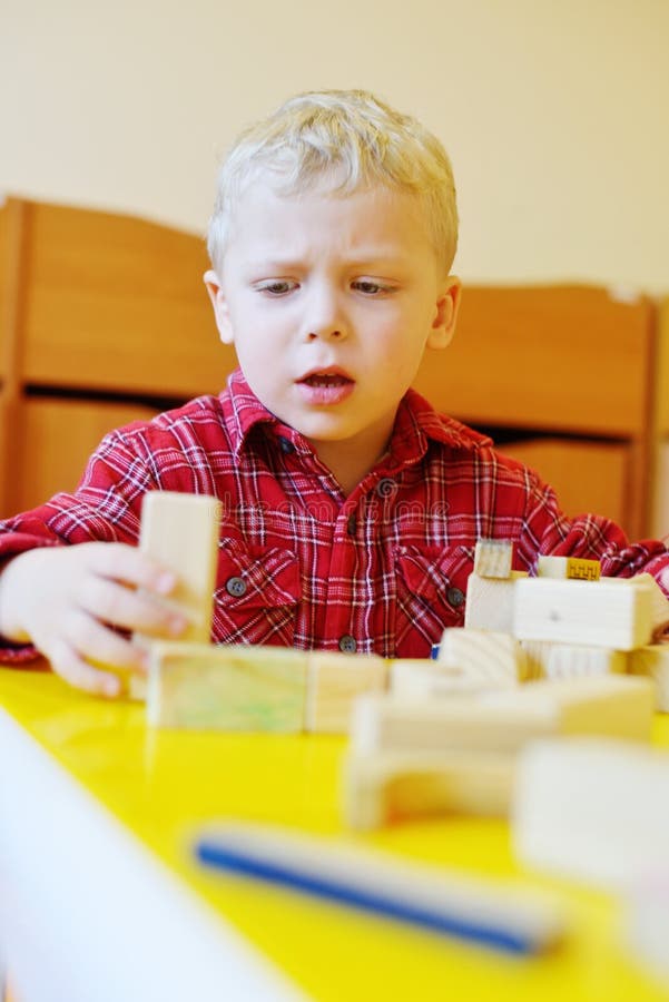 Toddler playing blocks stock image. Image of lifestyle - 66627603