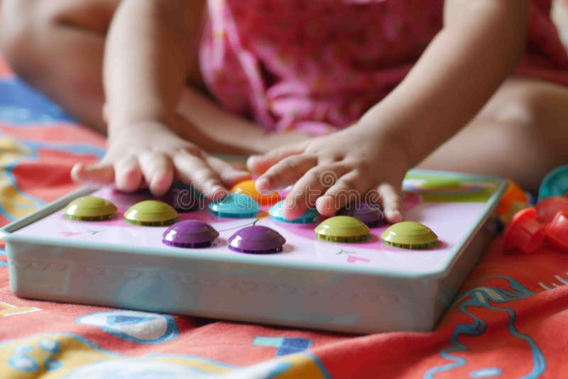 Toddler Playing with Counting Math Learning Toy . Stock Photo - Image ...