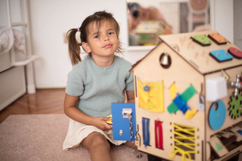 Little Girl Playing Interactive Games for Good Development at Home ...