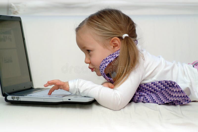 Toddler playing on laptop stock photo. Image of young - 2847014