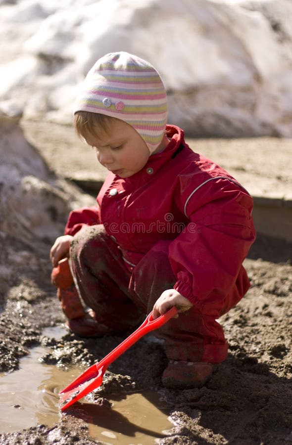 Toddler playing in mud stock image. Image of muddy, toddler - 13753797