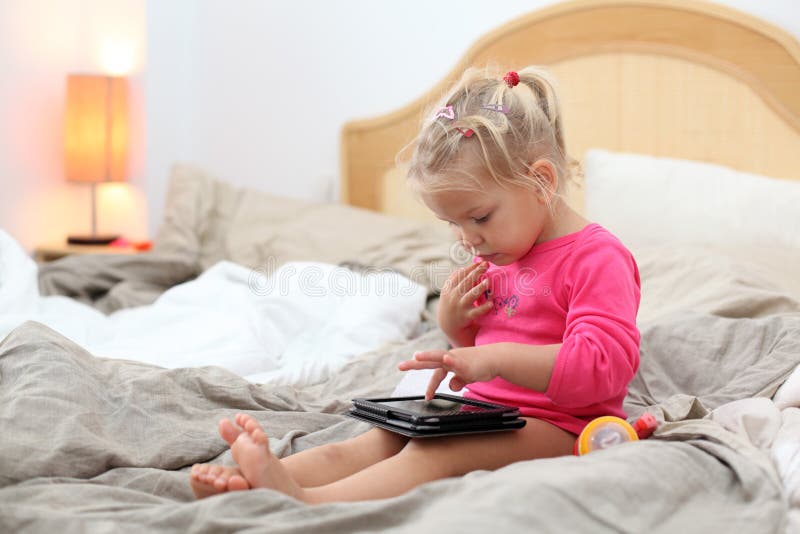 Toddler Playing with a Tablet Pc Stock Photo - Image of girl, caucasian ...