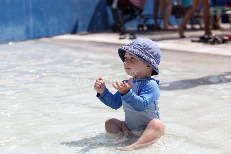 Toddler in pool stock image. Image of cute, lovely, blue - 26892785