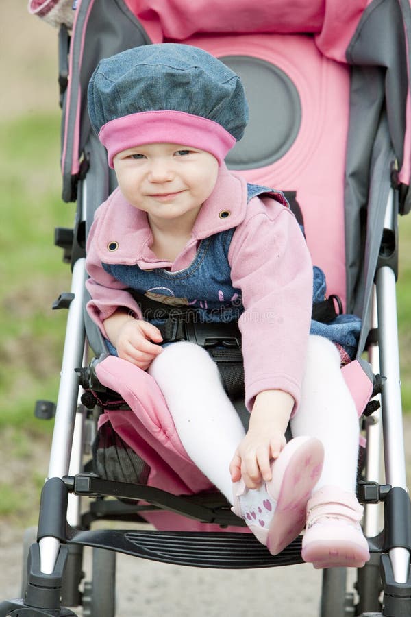 Toddler in pram stock photo. Image of child, kids, children - 12837256