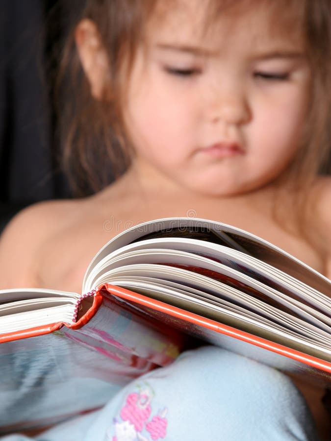 Toddler Reading a Book stock photo. Image of informal - 1777428