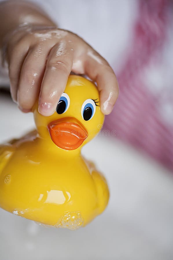 Toddler with rubber ducky stock photo. Image of ducky - 19349166