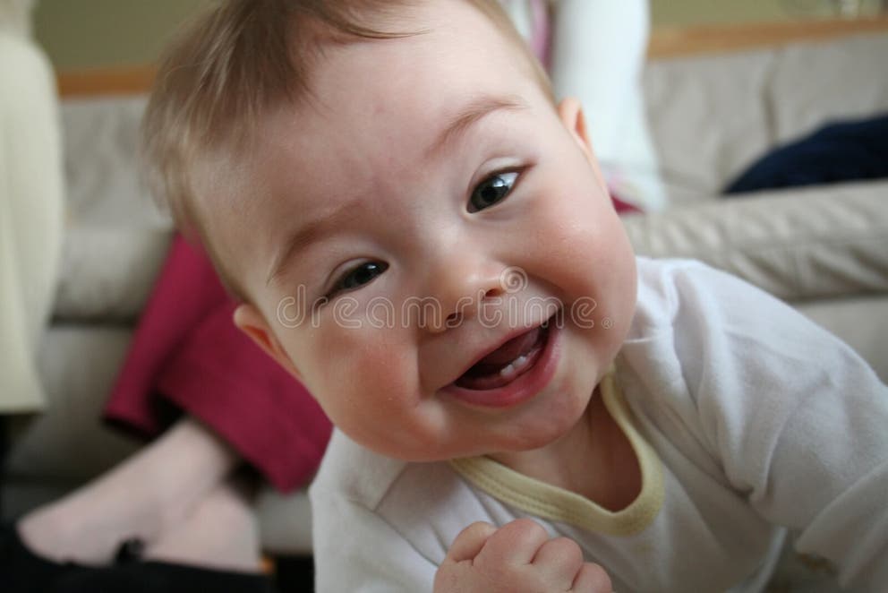 Toddler Smiling stock photo. Image of months, sofa, face - 5410514