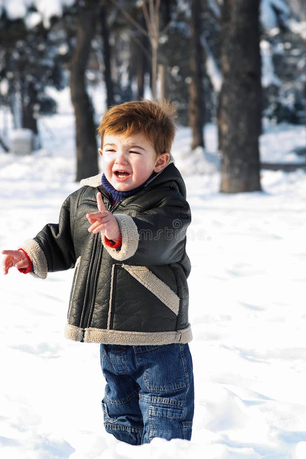 Crying baby on the snow stock image. Image of girl, emotion - 4887151