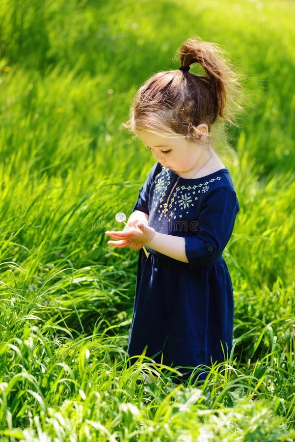 Toddler in spring stock photo. Image of beautiful, flower - 53624010