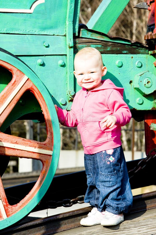 Toddler at steam machine stock image. Image of infant - 14035585