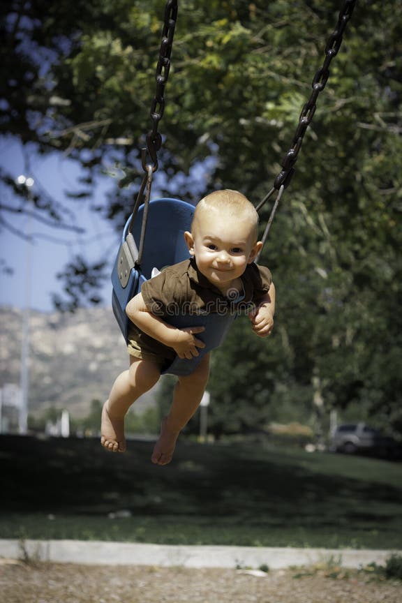 Toddler on a swing stock image. Image of optimism, closeup - 20685321