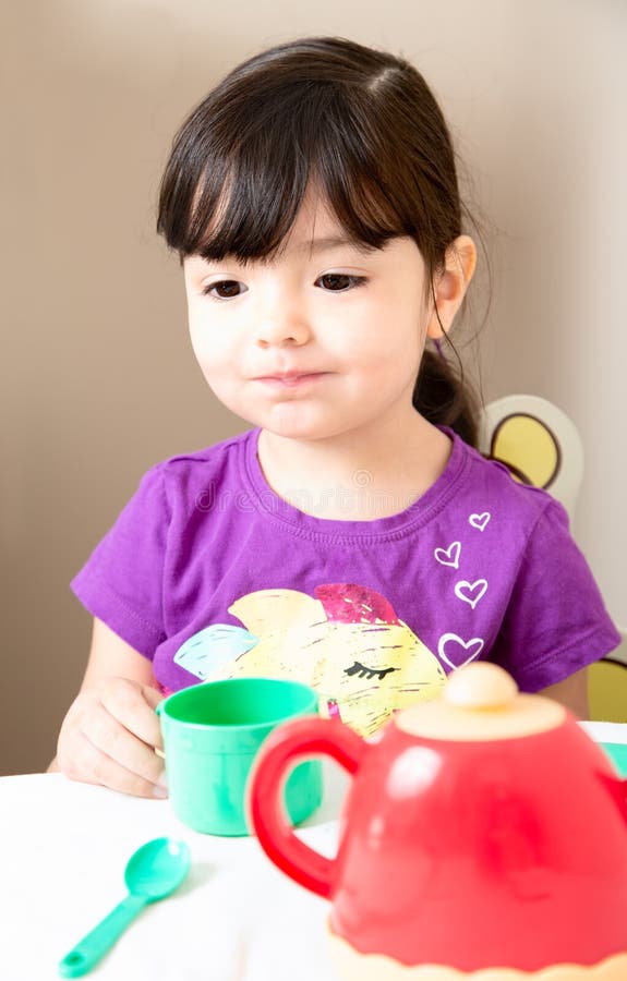 Toddler Thinking at Tea Time Stock Photo - Image of coffee, relaxing ...
