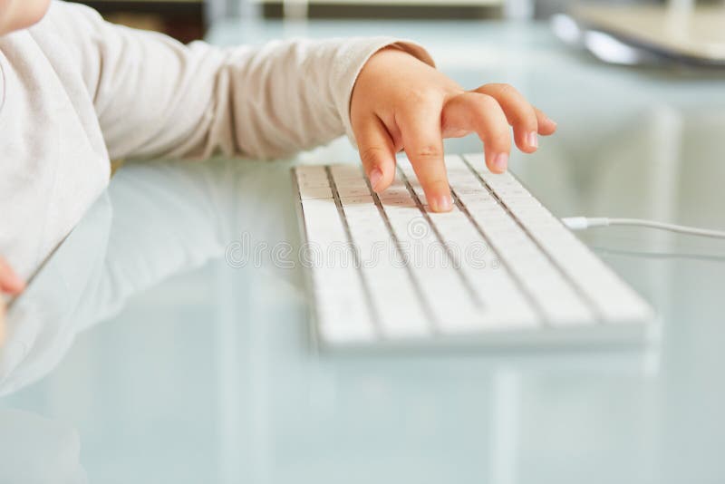 Toddler Types on the Computer Keyboard Stock Photo - Image of finger ...