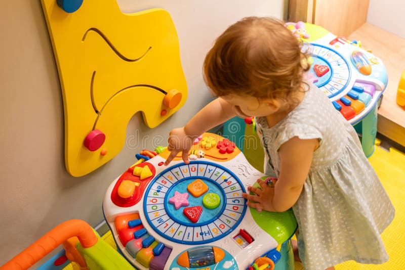 Toddler Using an Interactive Toy for Learning Shapes. Concept of Fun ...