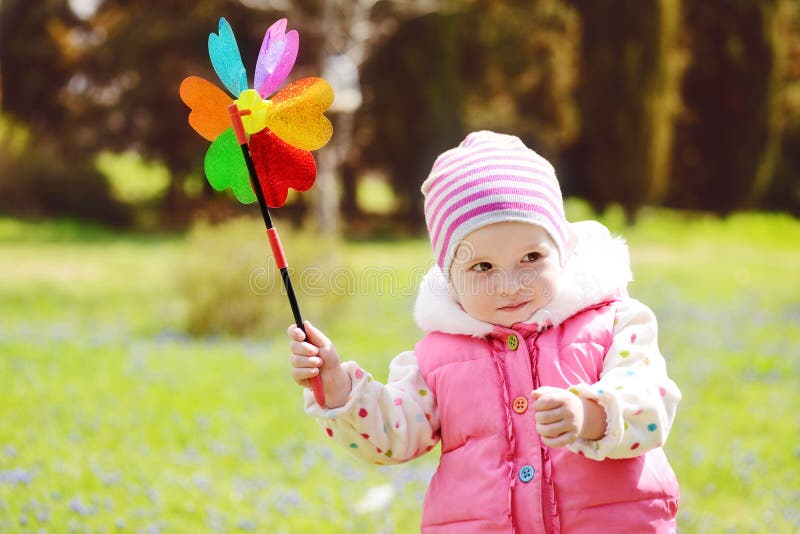 Toddler with windmill stock photo. Image of female, baby - 34330686
