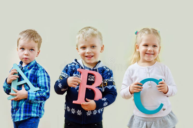 Toddlers with letters abc stock image. Image of letter - 67291863