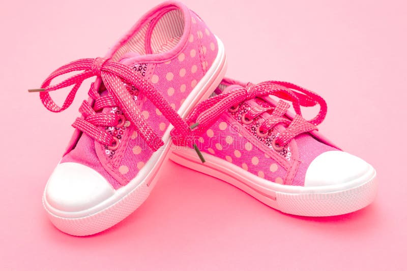 Little Girls Pink Baby Shoes Stock Photo - Image of pink, macro: 24736296