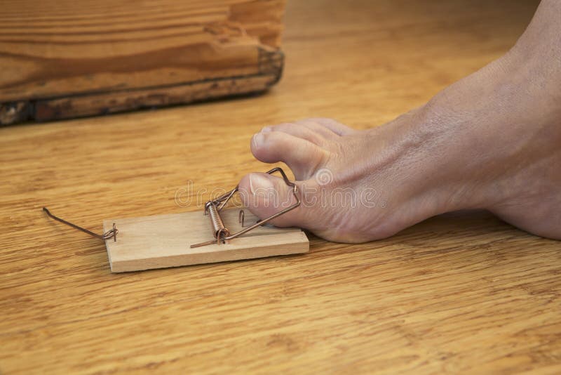Toe caught in mousetrap stock image. Image of caught - 61872367