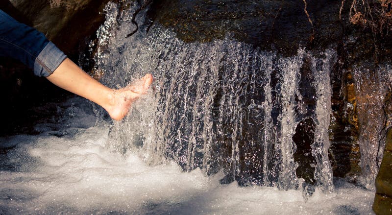 Toe in a cold waterfall stock image. Image of water, barefoot - 78213077
