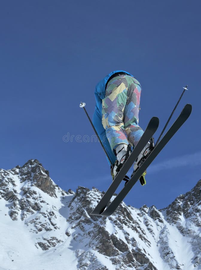 Toe touch stock photo. Image of jump, goggles, mountains - 12912946