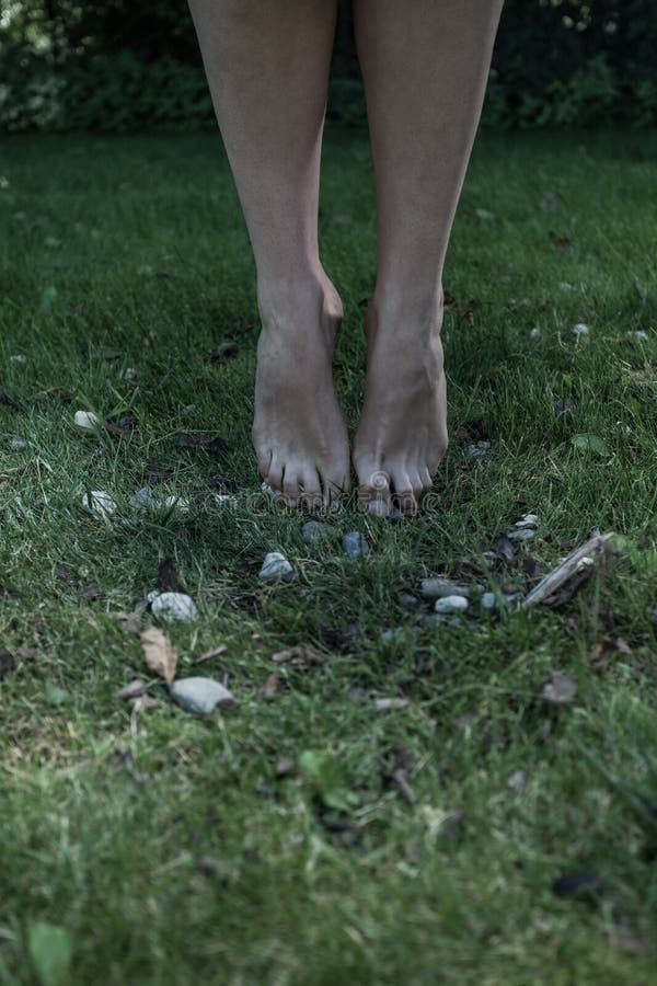 Toes touching the grass stock image. Image of legs, desperate - 43913011