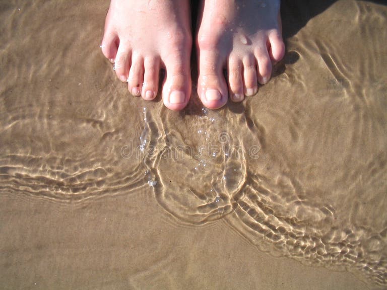 Toes in the water stock image. Image of alone, adult, shore - 854429
