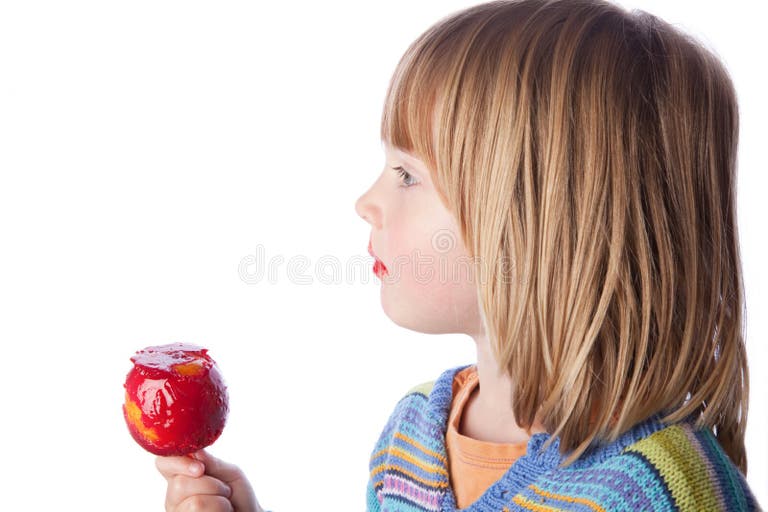 329 Kid Eating Candy Apple Stock Photos - Free & Royalty-Free Stock ...