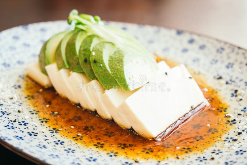 Tofu and avocado stock image. Image of plate, salad, bowl - 93474215
