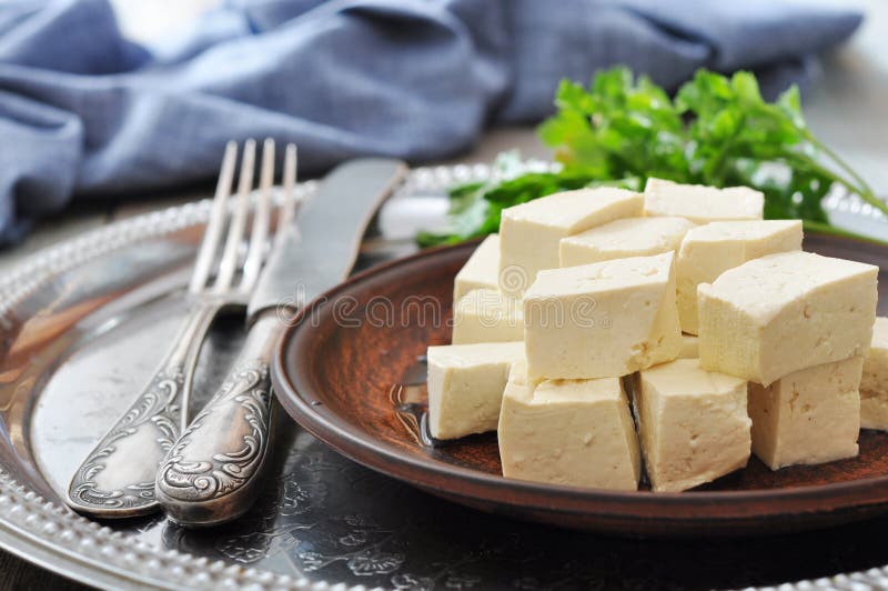 Tofu on plate stock photo. Image of protein, fork, asian - 35826808