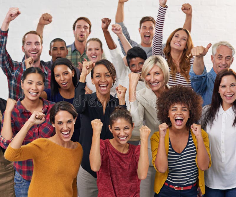 Together Everyone Achieves More. a Group of Colleagues Punching the Air ...