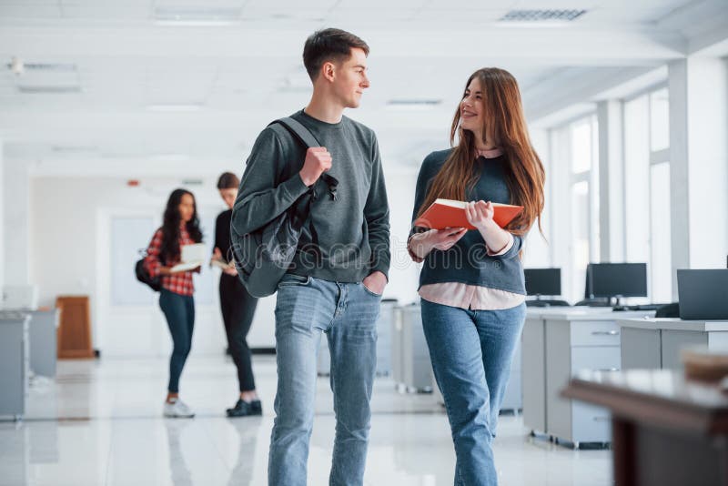 Always Together. Group of Young People Walking in the Office at Their ...